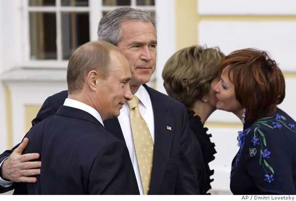 Summit opens without WTO deal for Russia / Bush, Putin differ over Iraq ...