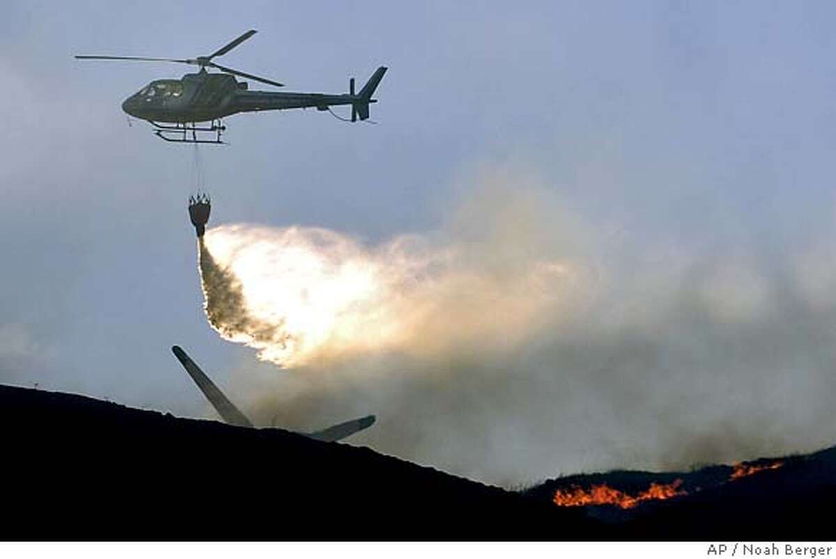 I-580 reopens; Altamont Pass wildfire partly contained