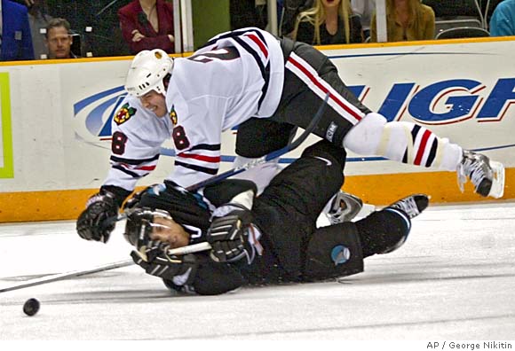 Sharks put on weight / 6-4, 210-pound Bell acquired from Chicago for ...