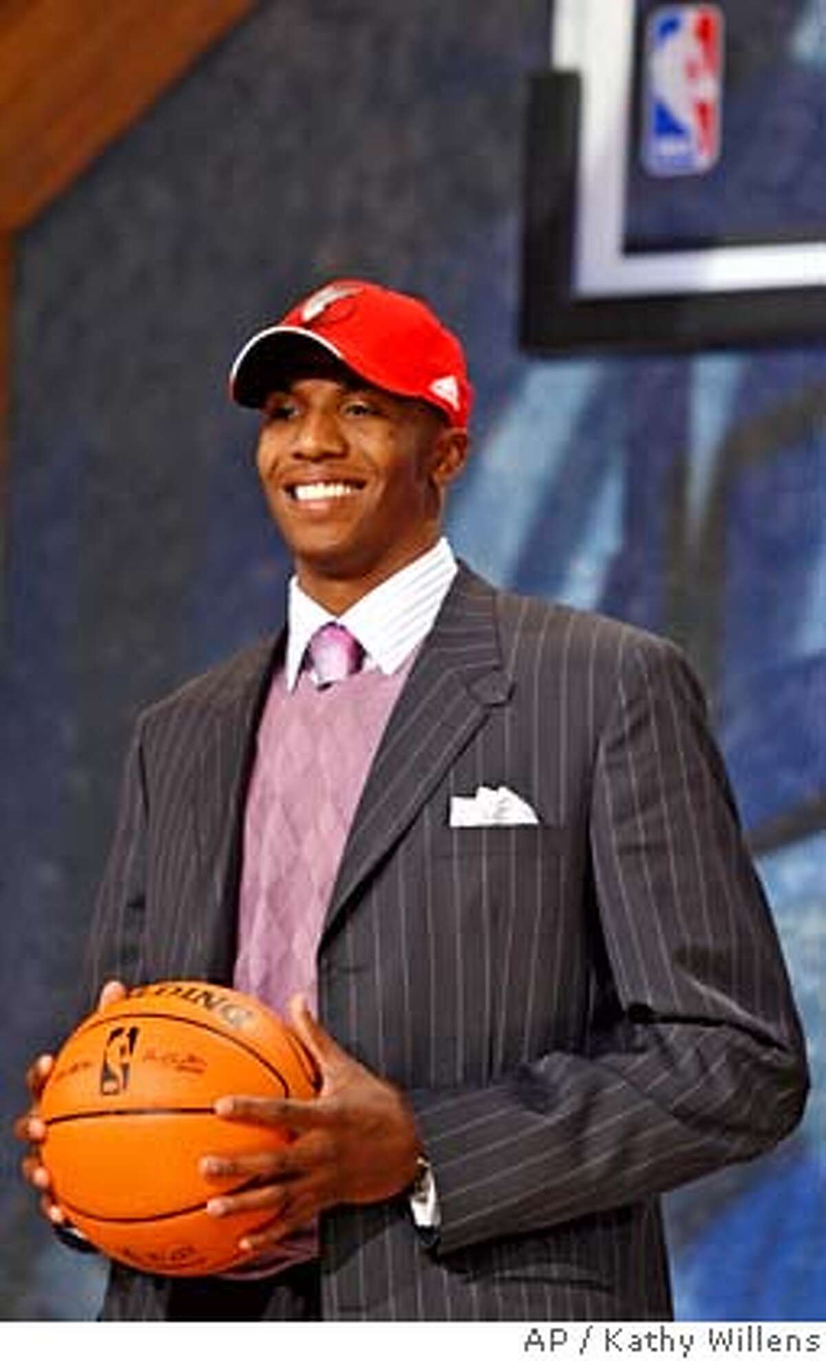 THINKING REALLY BIG / Warriors bolster front line, draft two 7-footers