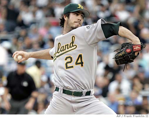 Rouse leads charge in debut / Infielder's 3 hits spark A's in N.Y.