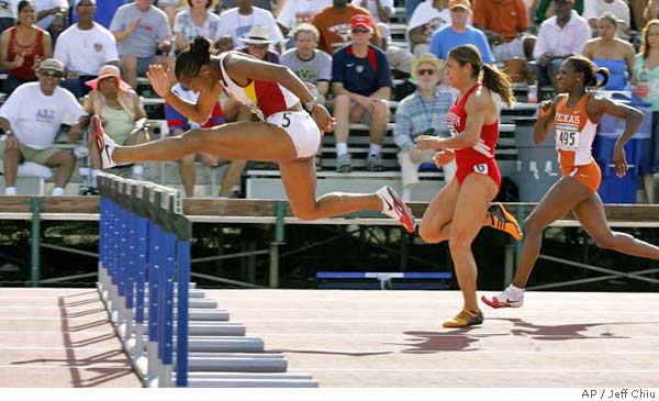 Powell tops NCAA record, sets sights on world mark