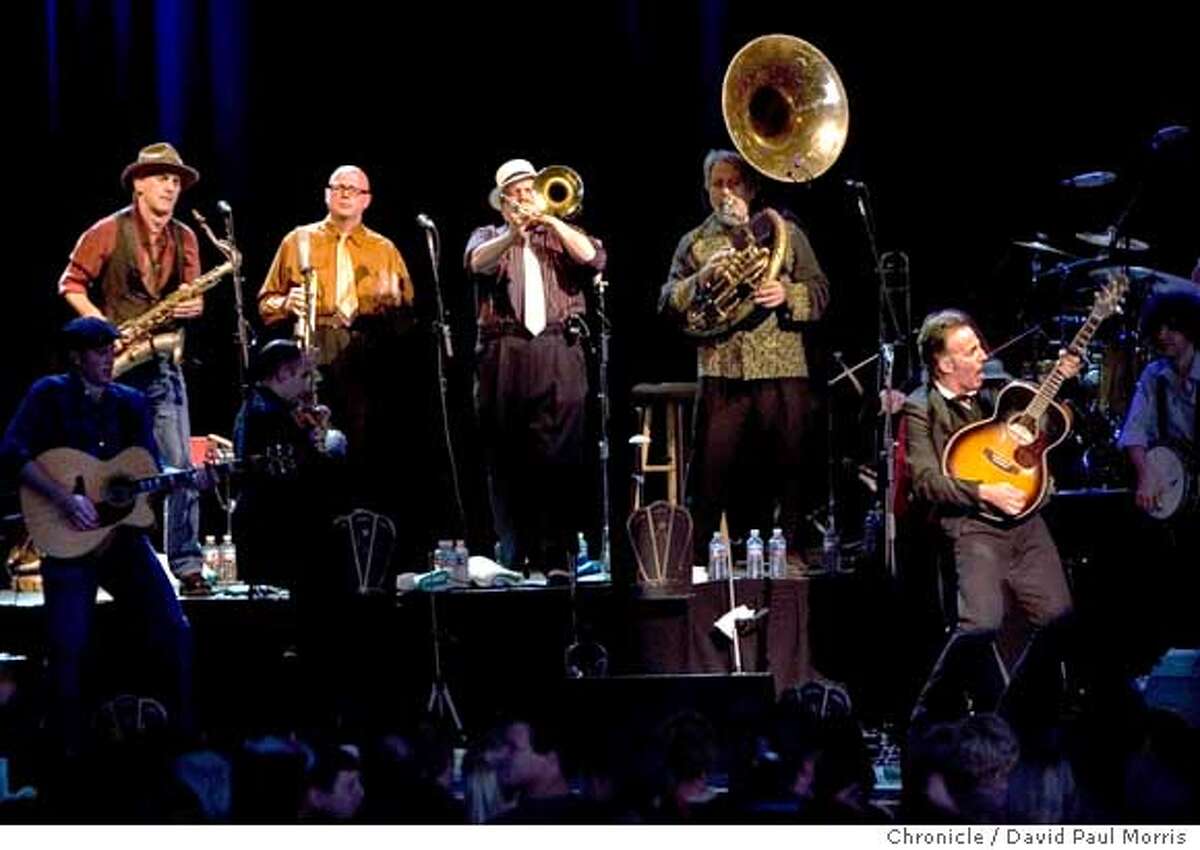 REVIEW / Springsteen gives old folk songs -- and a few of his own -- a ...