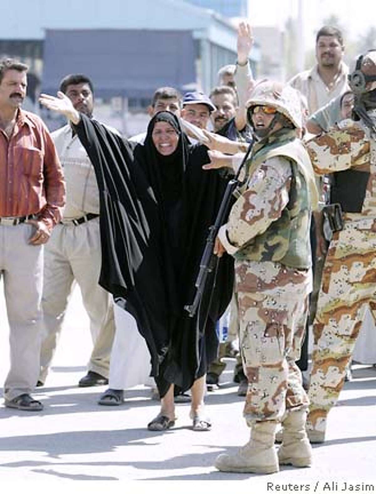 Families reunite as first of 2,500 inmates set free / Nearly 600 ...