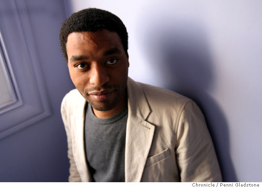 Ejiofor Takes a Walk in Drag Queen Boots