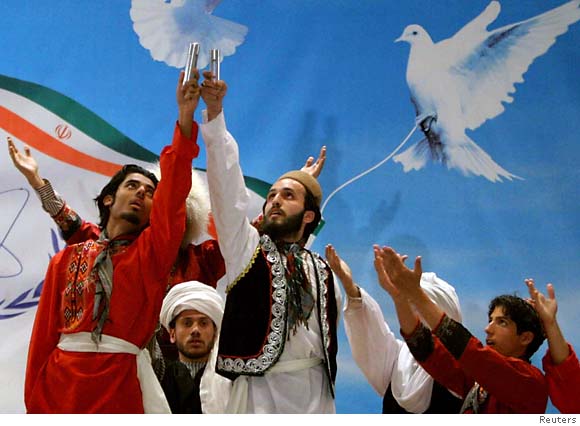 Iran celebrates uranium enrichment / Experts say nuclear step means ...
