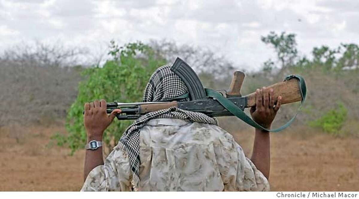 THIS GUN FOR HIRE / Aid agencies in Somalia are forced to use local ...