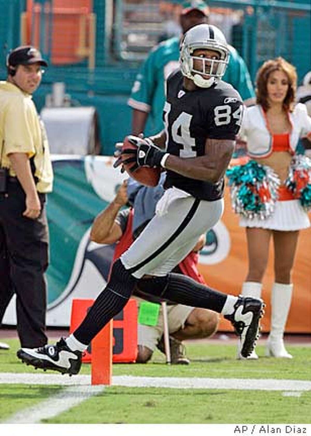 Raiders run past Dolphins and into first place