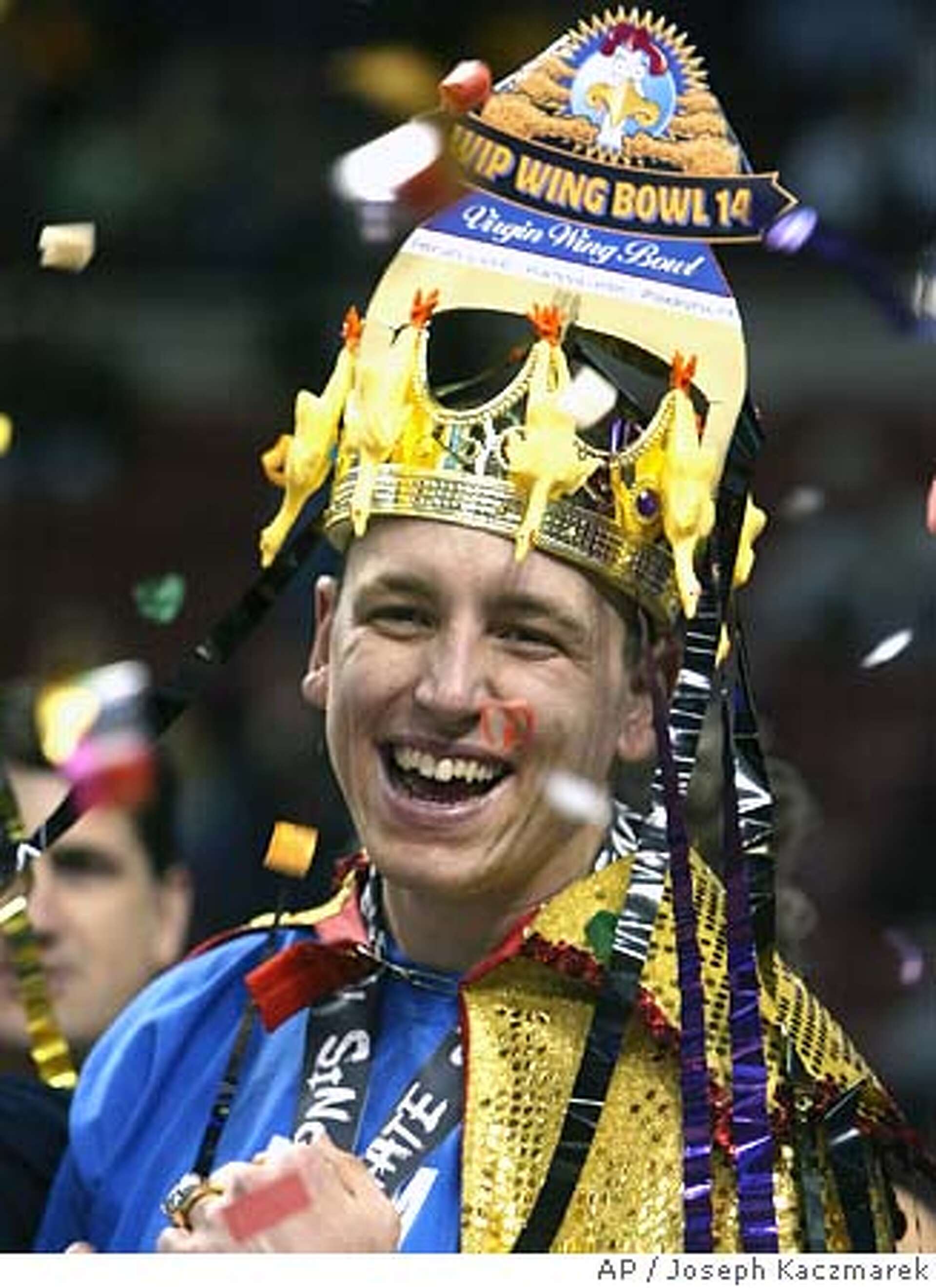 PHILADELPHIA / King of the wingding / San Jose man sets eating record ...