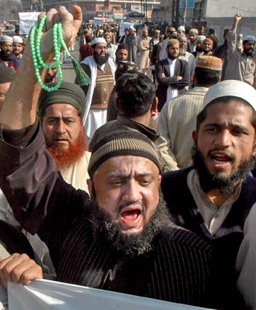 Muslims furious over depictions of Muhammad / Cartoons spark boycotts ...