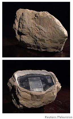 Russia accuses 4 Britons of using fake rocks to spy