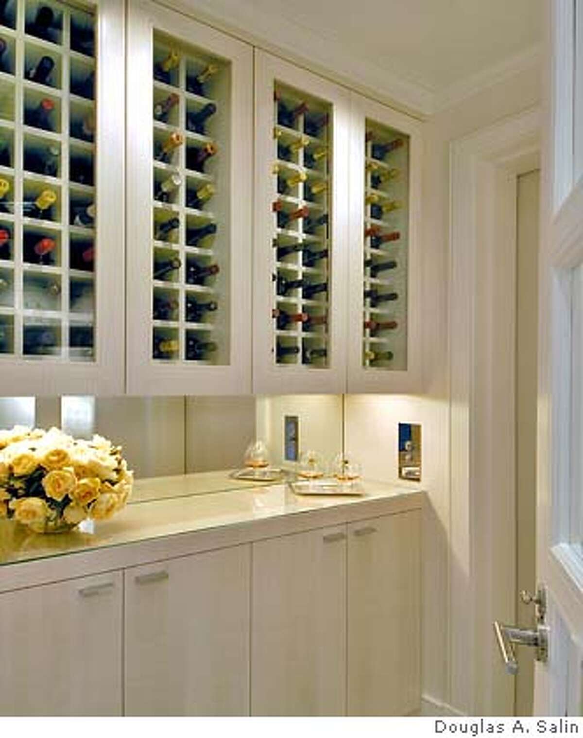 A humdrum elevator vestibule becomes an elegant space-saving wine ...