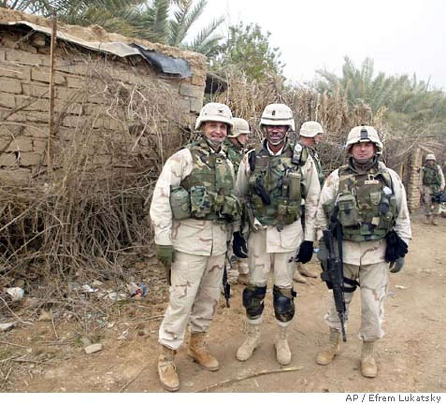 Hussein's hideaway a squalid shambles / Hut, litter belie former leader ...