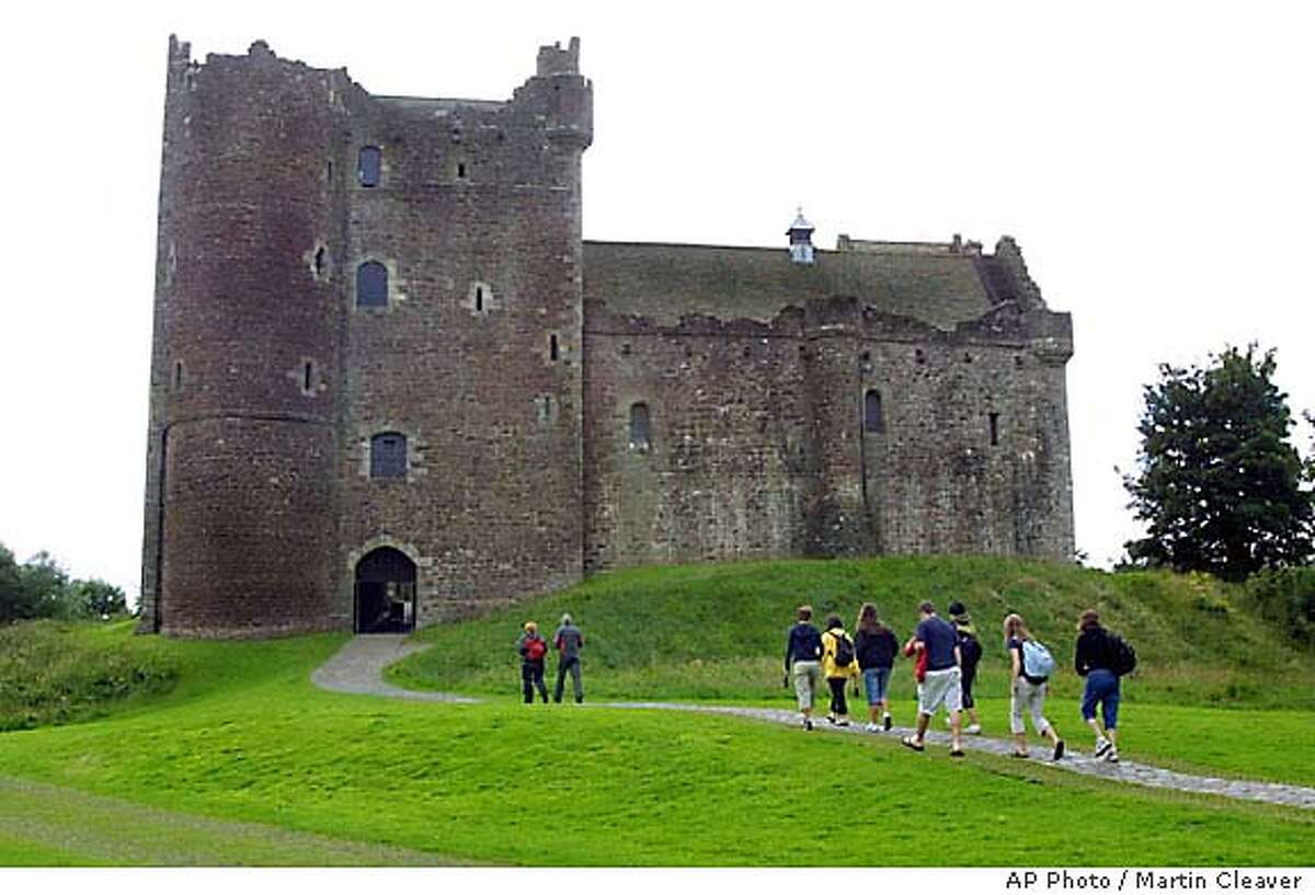 Fans seeking 'Holy Grail' storm Scottish castle / Giggles echo at ...