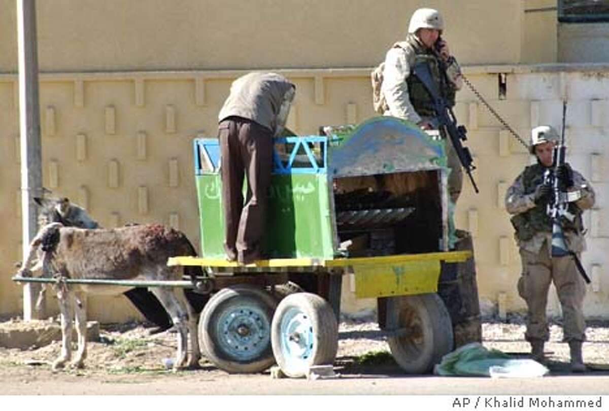Wily foe fires rockets from carts / Iraqi insurgents deploy donkeys on ...