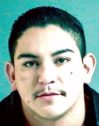 Brother of slain police officer lashes out at the killer in court