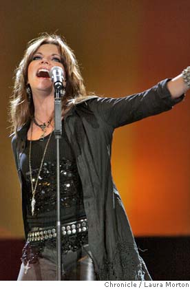 McBride snarls, struts and brings fans to their feet