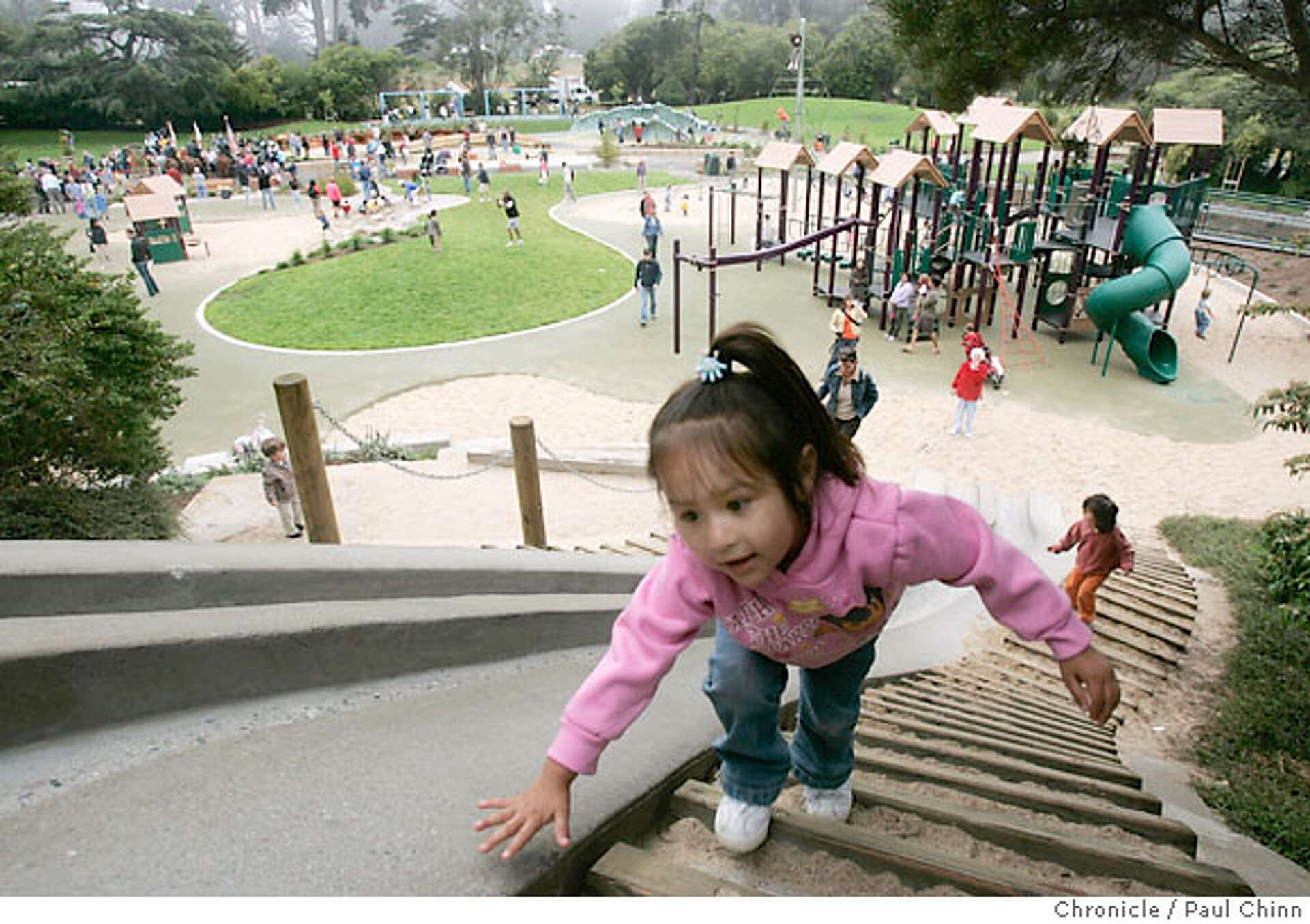 GOLDEN GATE PARK / Kids leap, slide, dig into remodeled playground