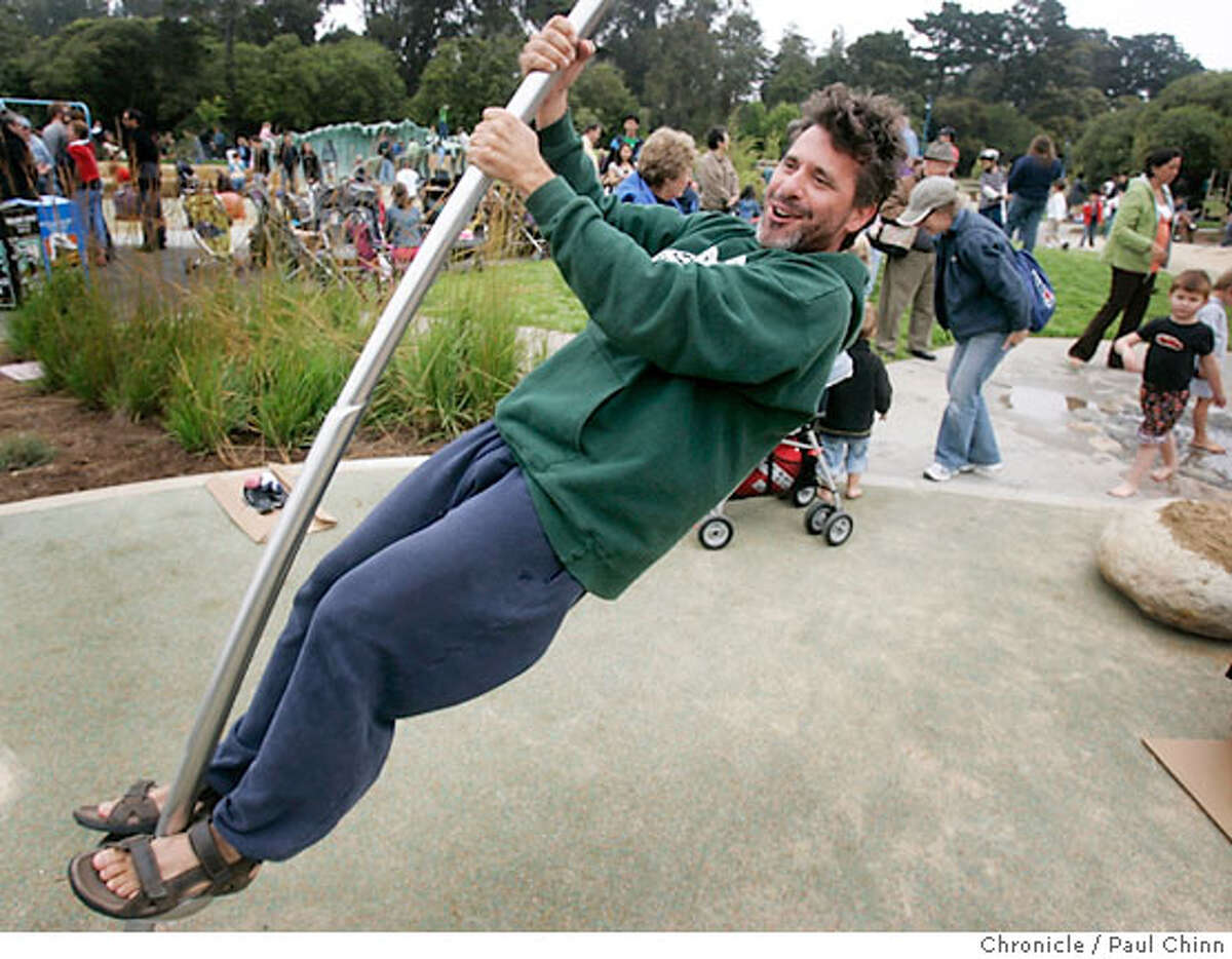 GOLDEN GATE PARK / Kids leap, slide, dig into remodeled playground