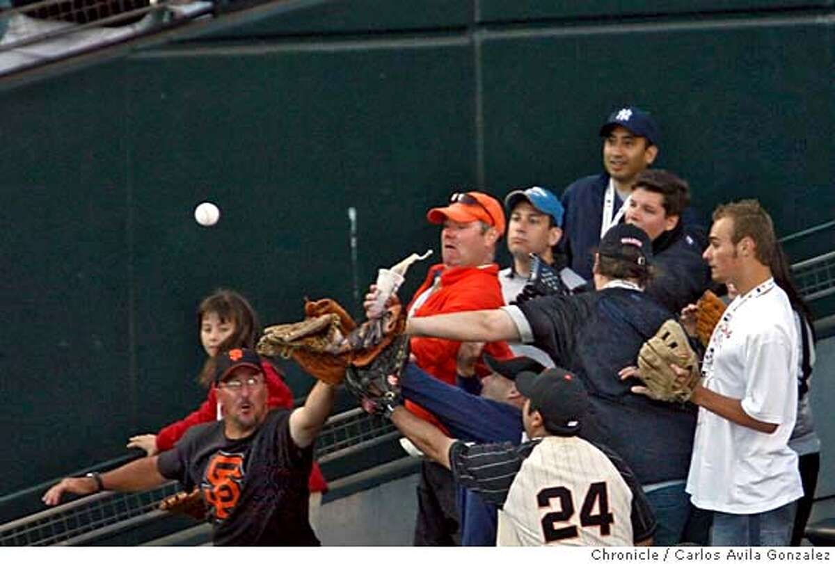 By land and by sea, fans chase home-run balls