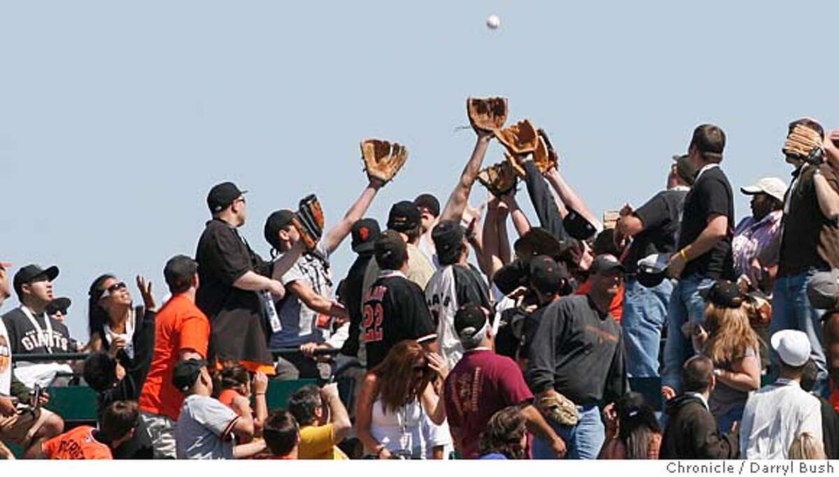 By land and by sea, fans chase home-run balls