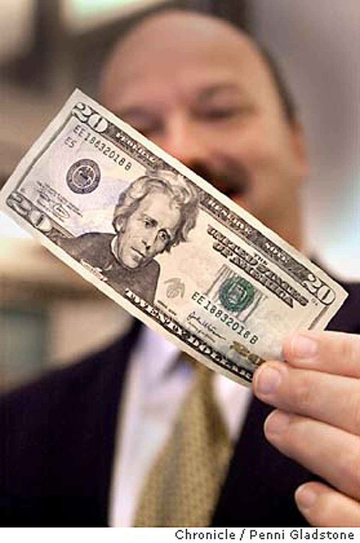 Colorized $20 bill makes debut