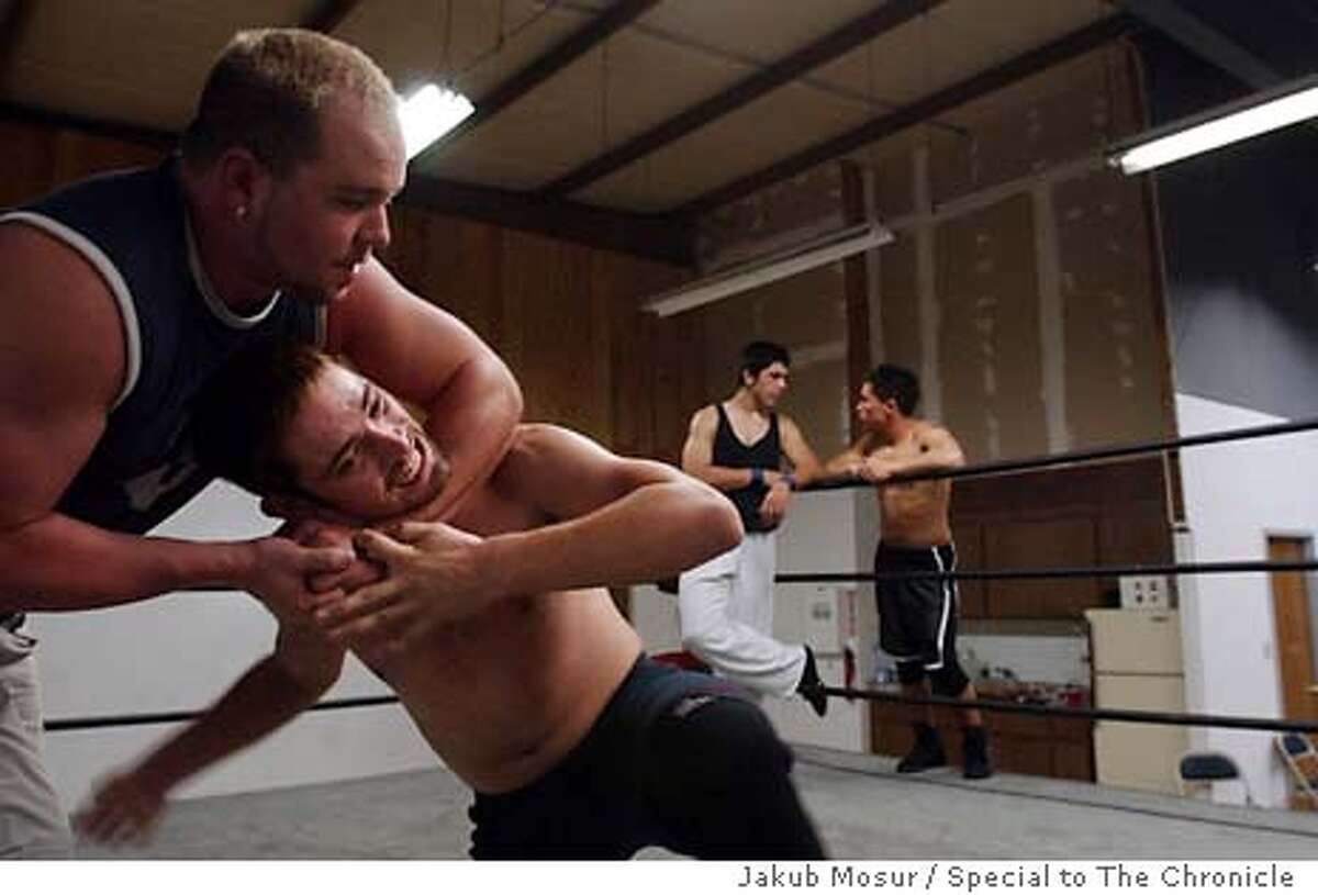 Throwing their hearts into the ring / Pro wrestling students give their ...
