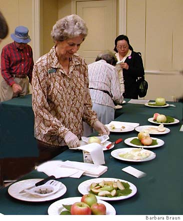 Tasting of heirloom fruit rings in autumn at Filoli