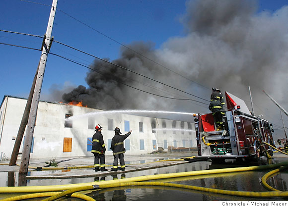 TREASURE ISLAND / Crews battle stubborn, smoky warehouse fire
