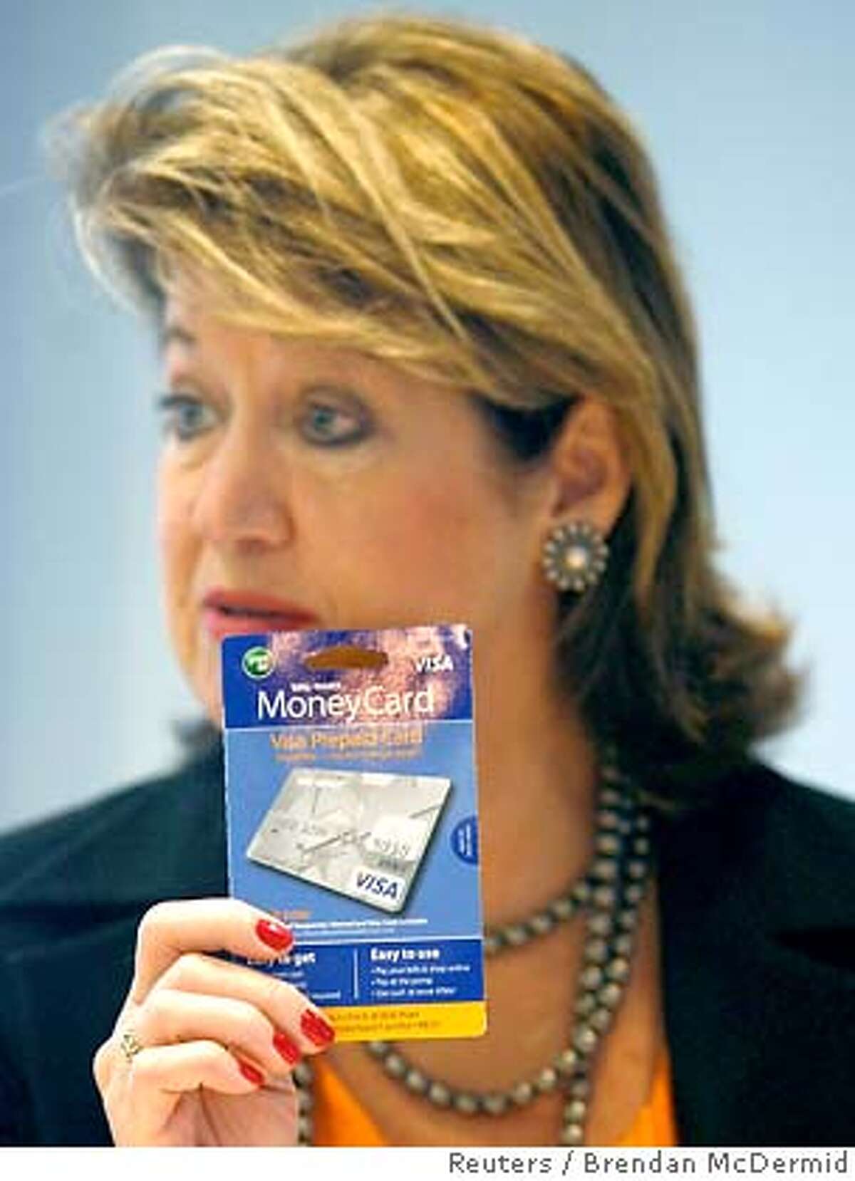 Wal-Mart to open money centers / Prepaid debit card among first of ...