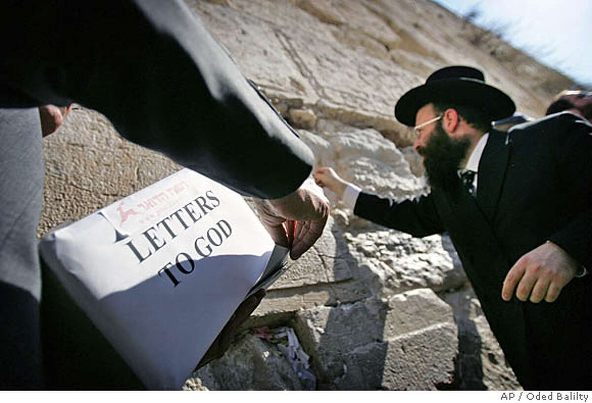 Where letters to God go / Gestures of hope reflect Holy Land's fervent ...