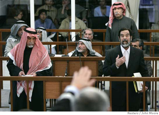 Uproar, grisly testimony at Hussein trial / Lawyers threaten walkout ...
