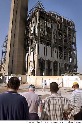 Bechtel under siege / Iraqis seethe as sabotage, red tape slow repair ...