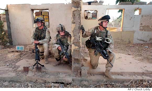 Iraq ex-defense chief in custody / General surrenders following ...