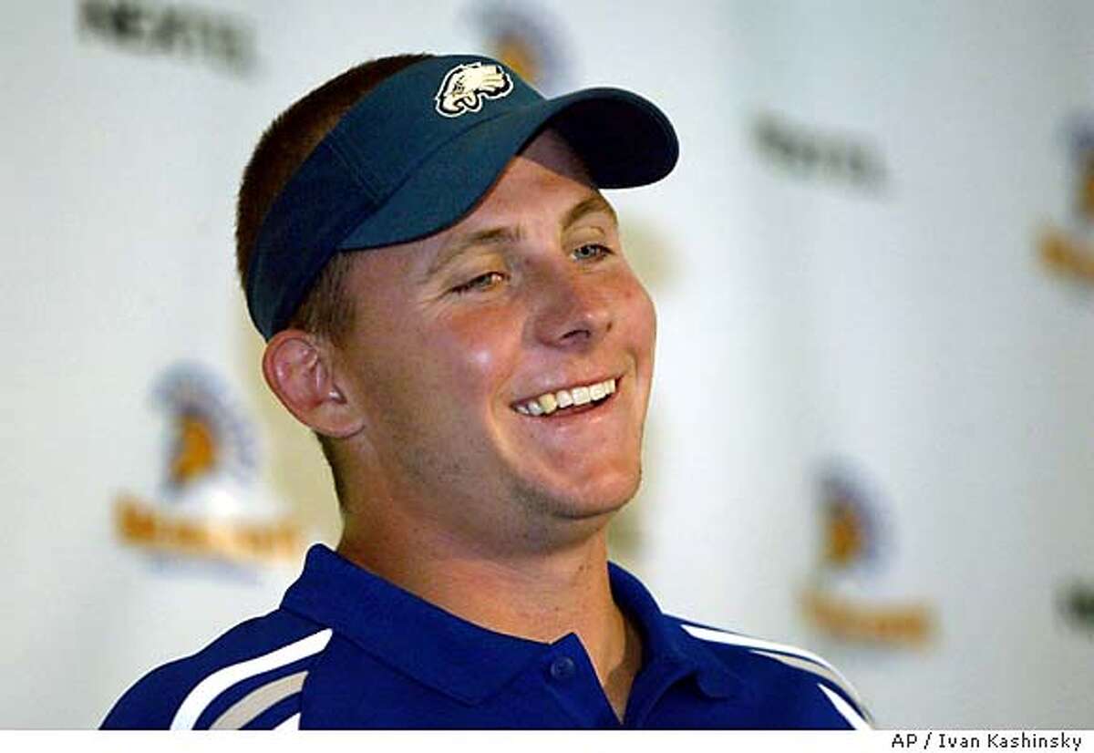 All eyes on Spartans' Parry / Media gathering to see amputee on punt team