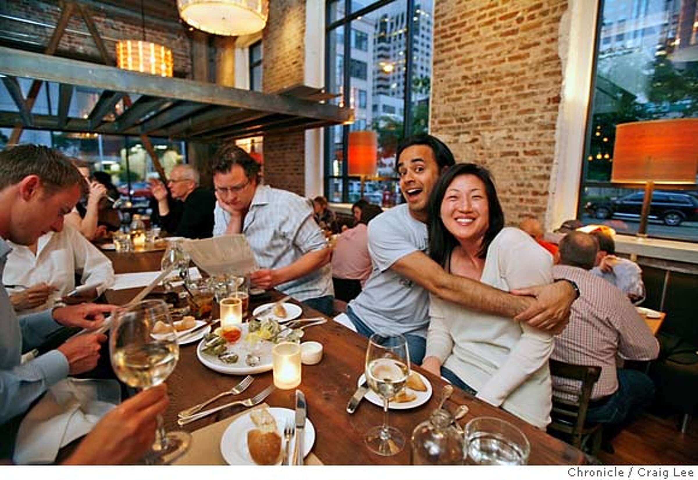 A PLACE AT THE TABLE / Restaurant communal dining catches on