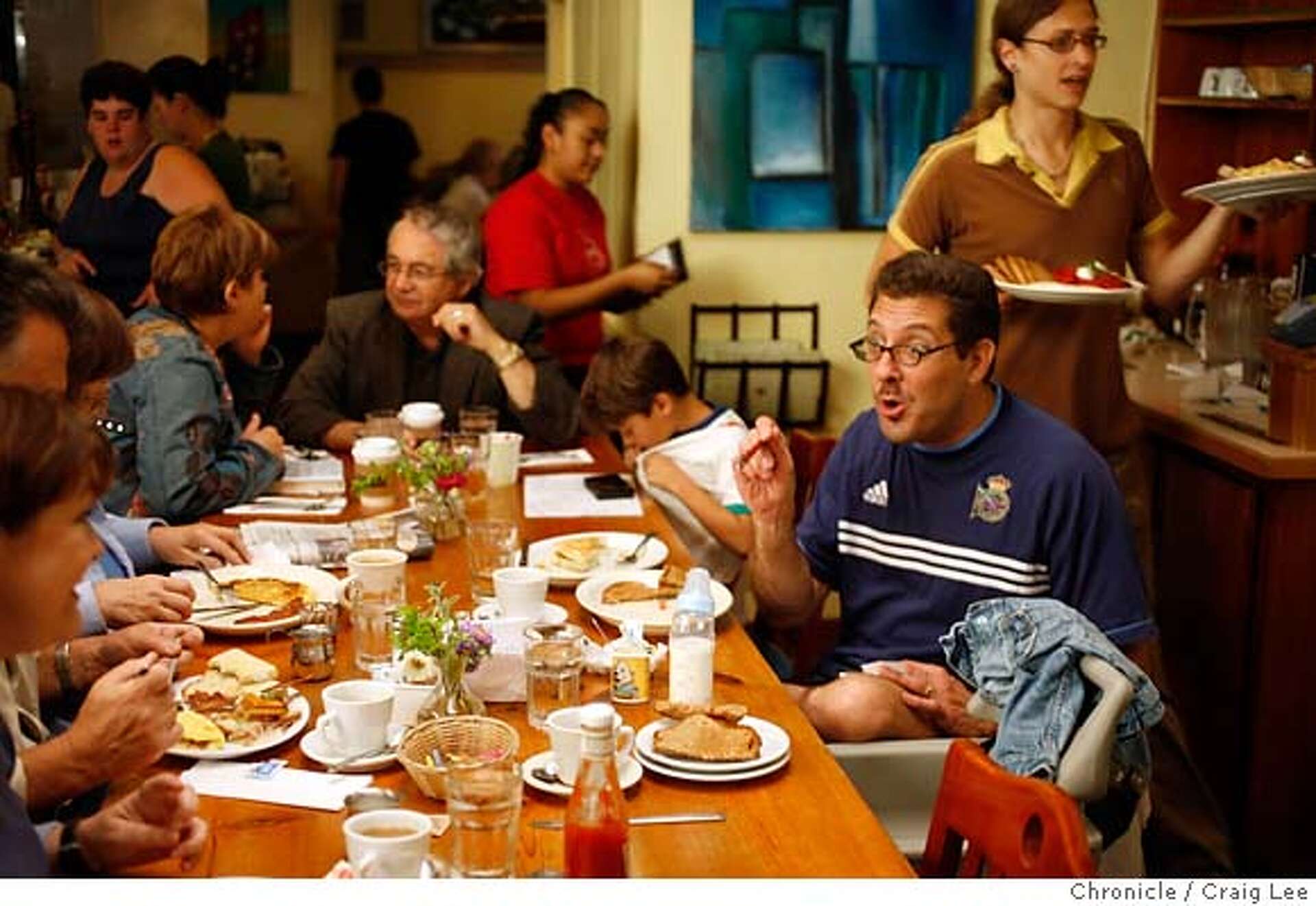 A PLACE AT THE TABLE / Restaurant communal dining catches on