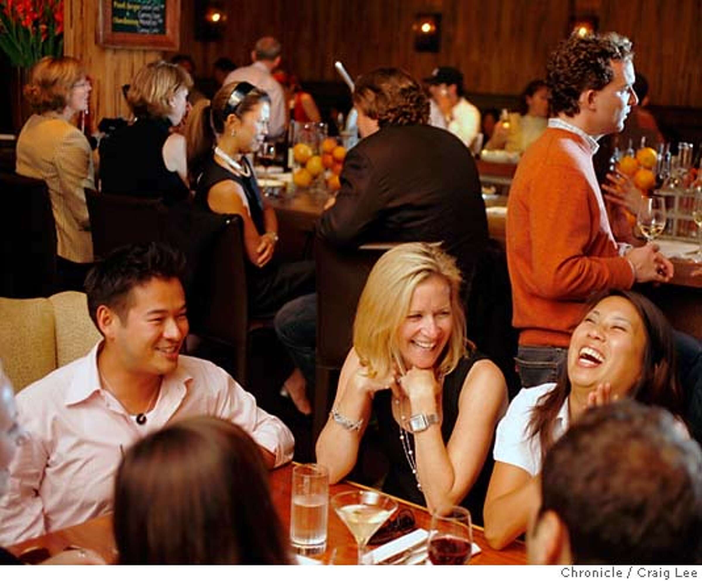 A PLACE AT THE TABLE / Restaurant communal dining catches on