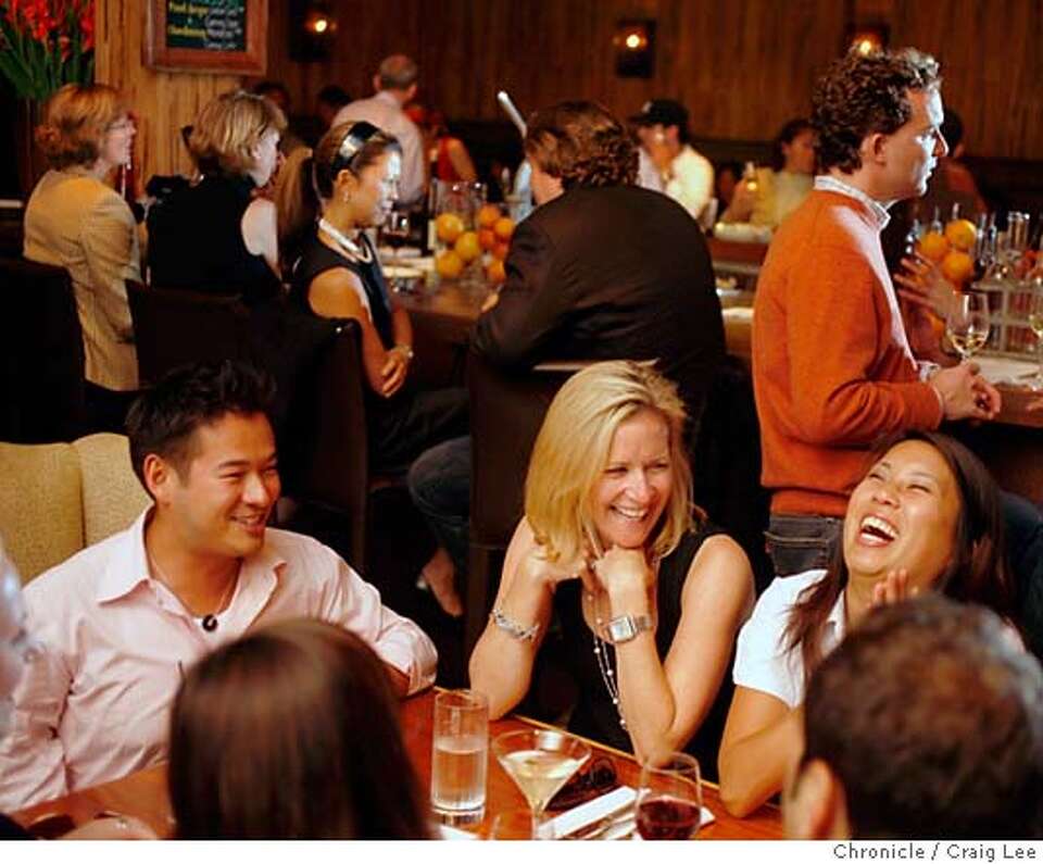 A PLACE AT THE TABLE / Restaurant communal dining catches on