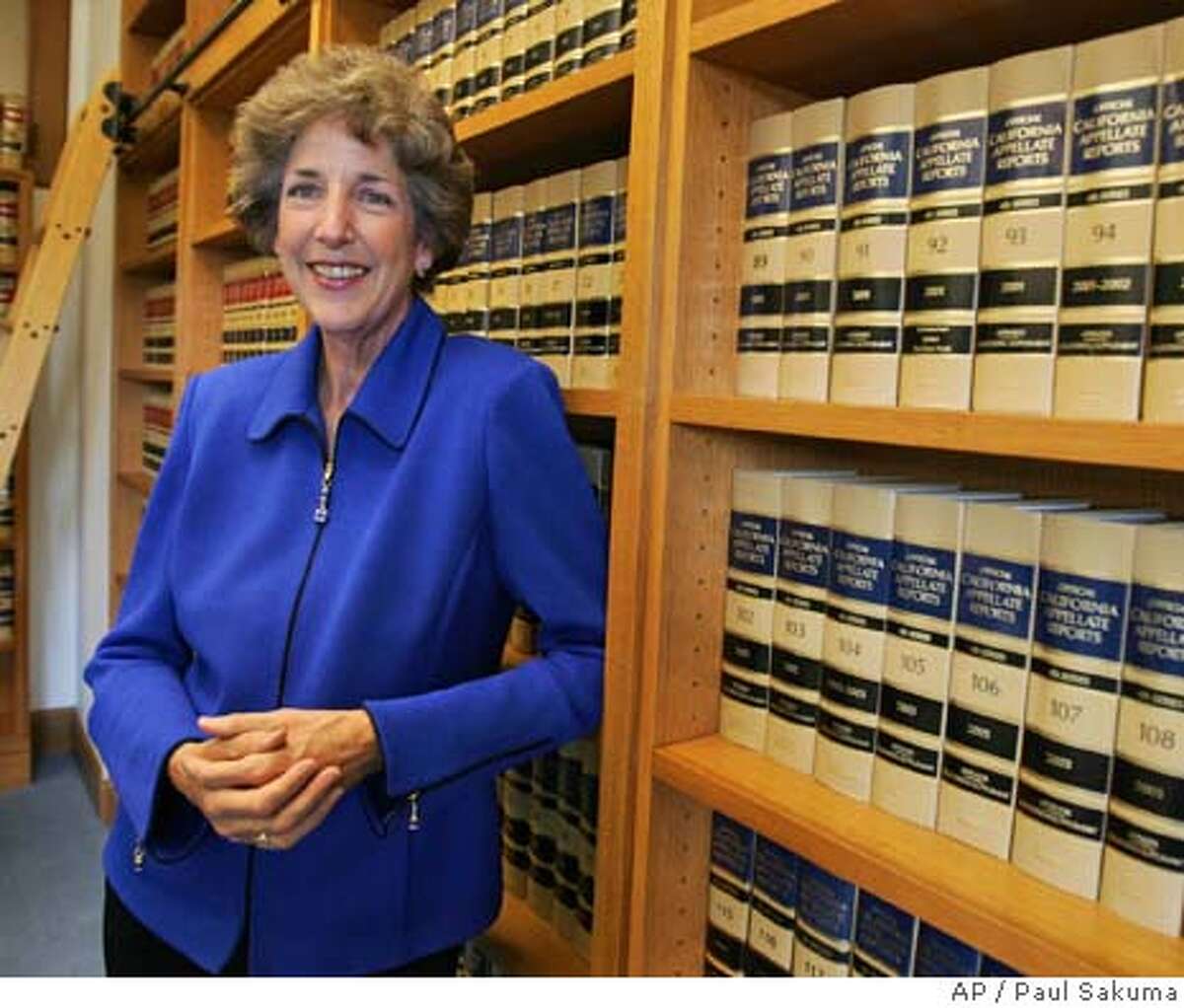 Governor picks moderate for top state court