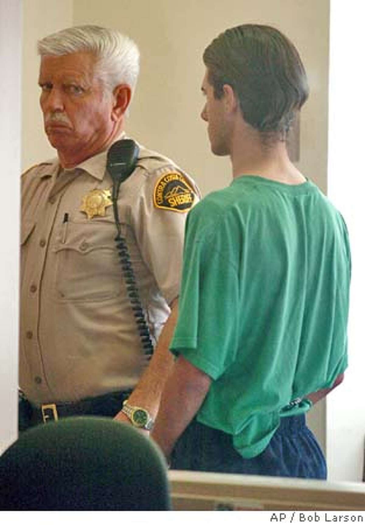 Mom accused as accessory / Teen murder suspect's mother arrested