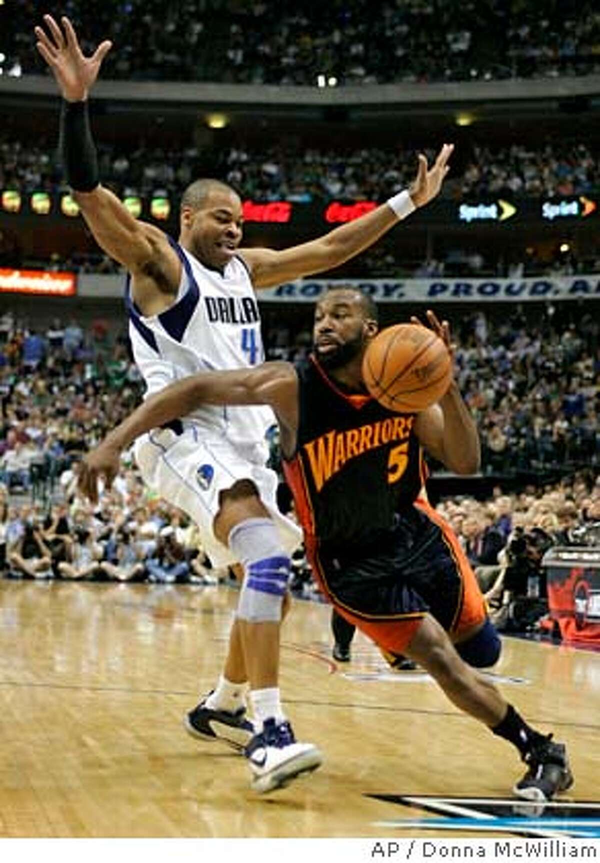 WARRIORS' WIN WORTH THE WAIT / Davis keys victory at Dallas