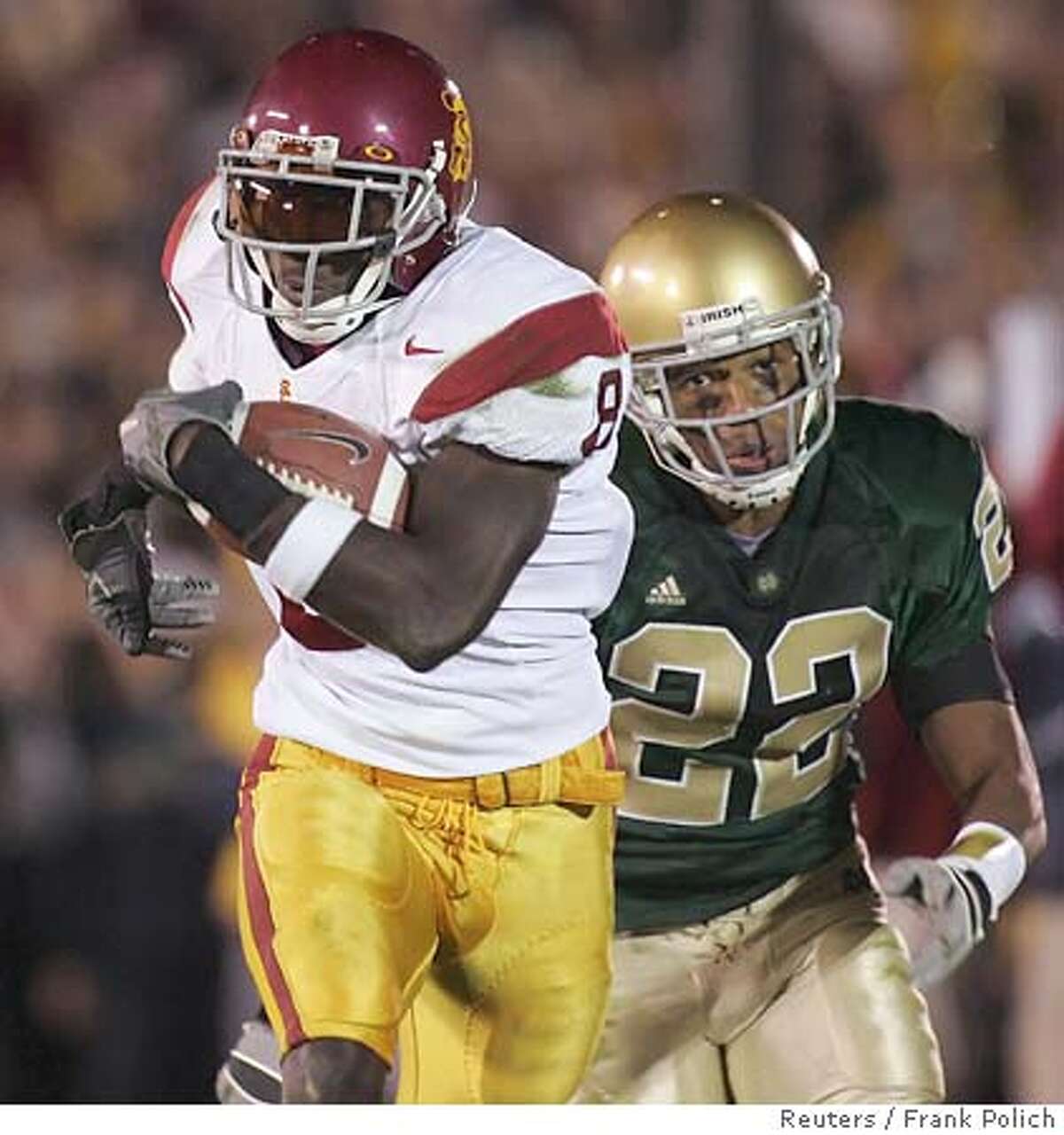 SECOND EFFORT / Leinart's goal-line dive gives No. 1 USC win in thriller