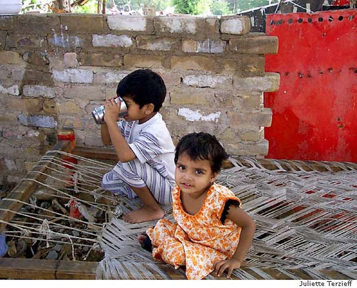 Pakistan's poorest find free homes come at a price / Residents feel ...