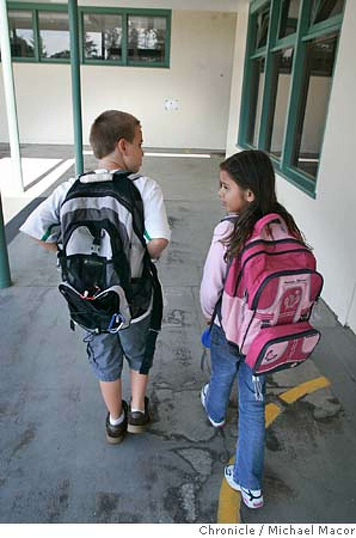 PALO ALTO / Kids' backpacks are a weighty subject / Experts fear heavy ...
