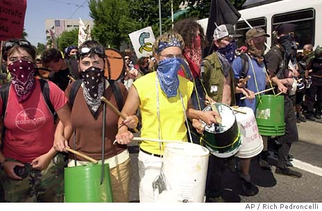 Protests greet agricultural conference / Hundreds march against ...