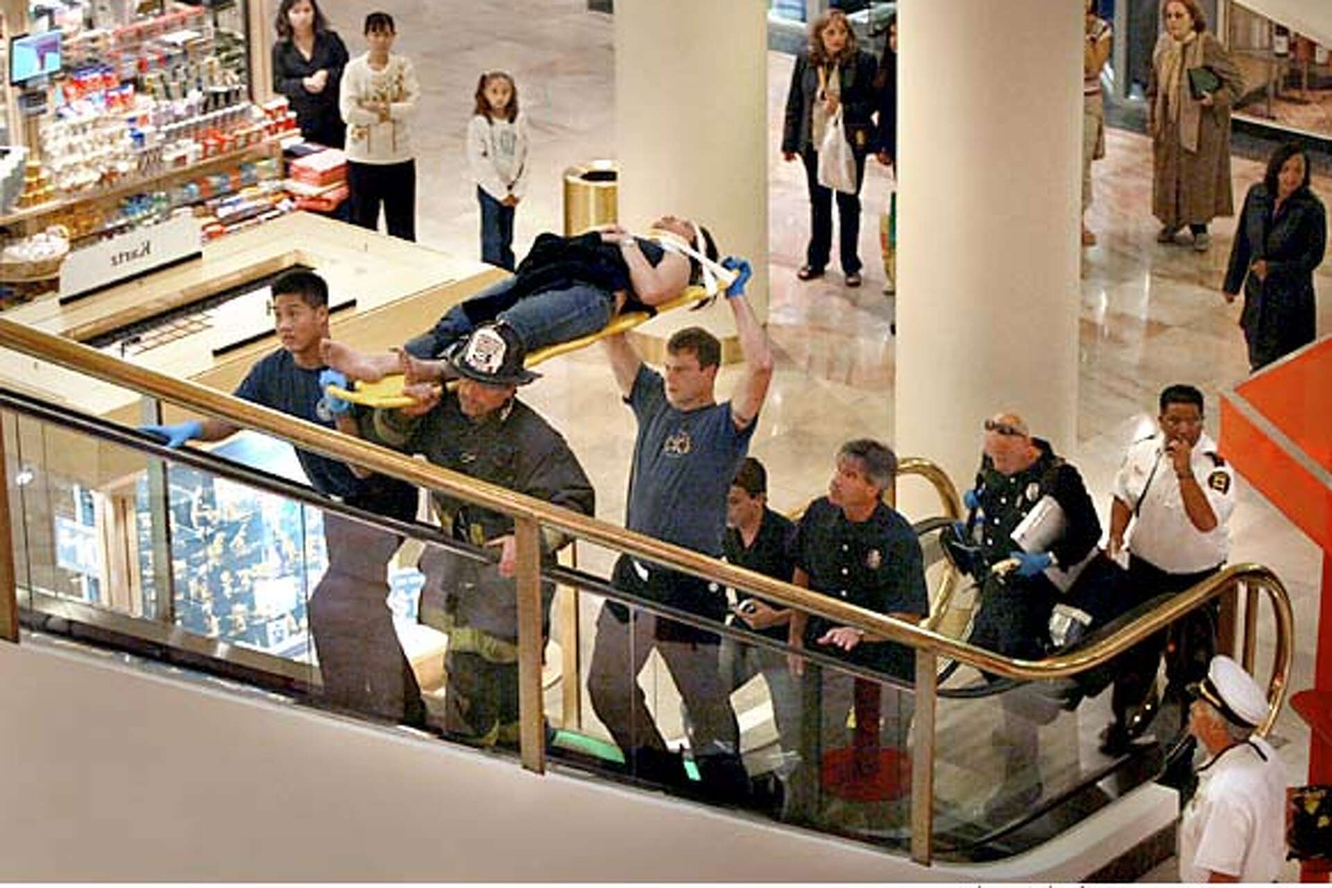 Jumper lands on woman at S.F. mall / Both injured as man jumps twice ...