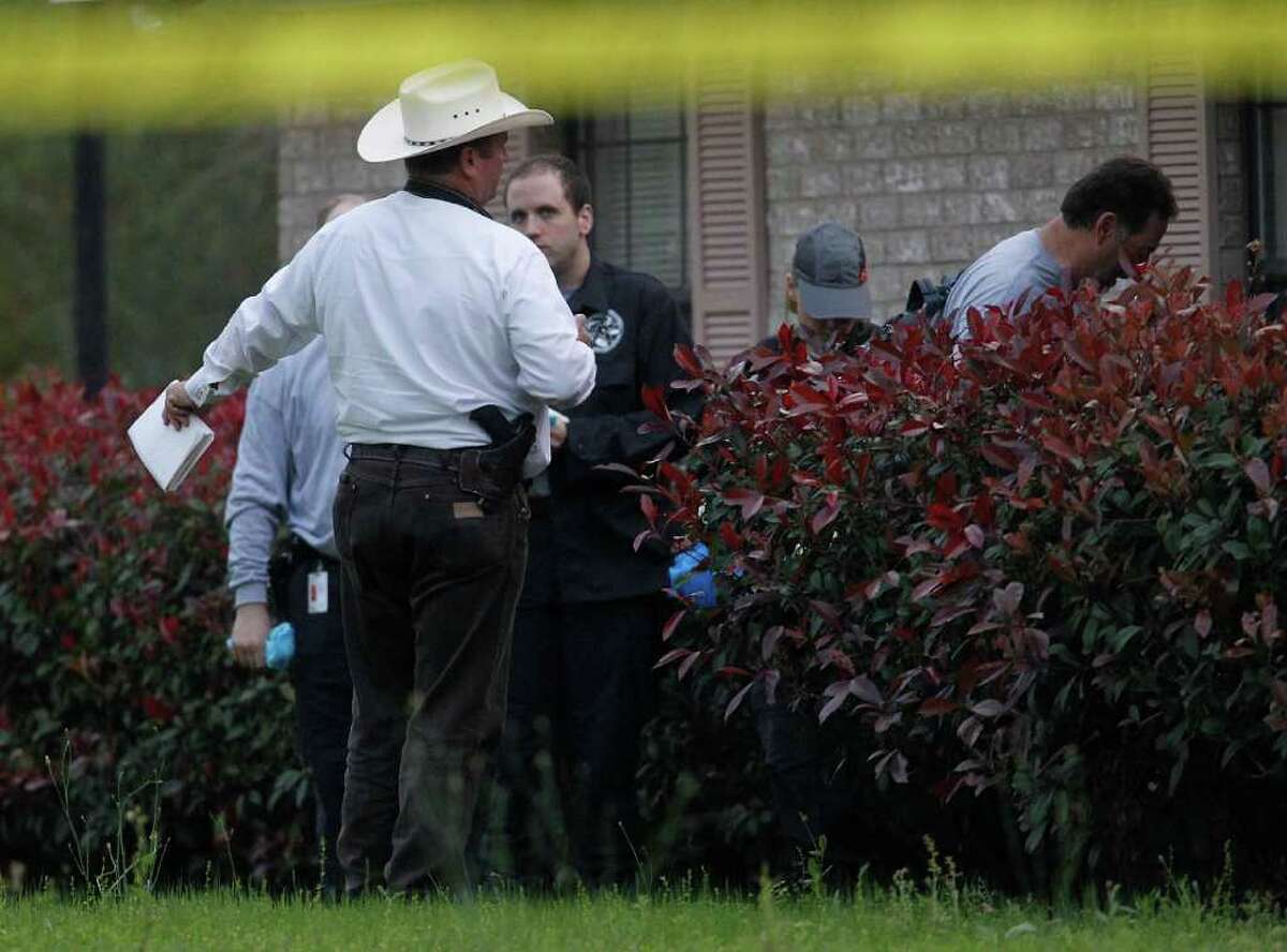 Son arrested in slayings of 3 in family