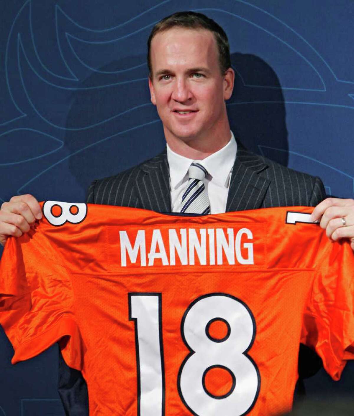 Now a Bronco, Manning says hello to his new team