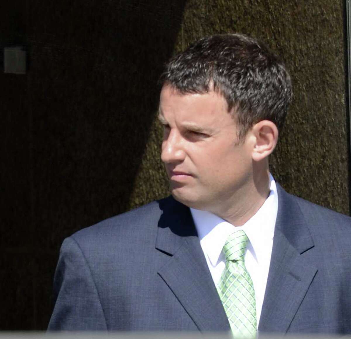 Ex-county prosecutor accused of attacking his wife